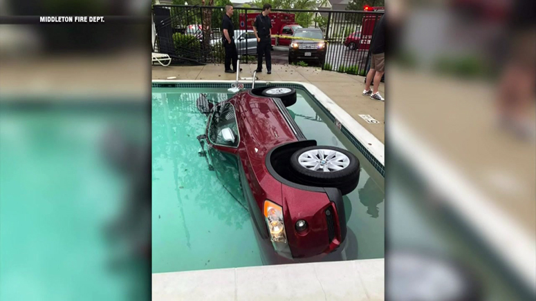 2 rescued after crashed SUV found teetering on edge of Middleton ...
