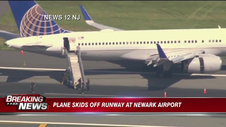 Plane landing at Newark airport blows tires, skids on runway - Boston News, Weather, Sports ...