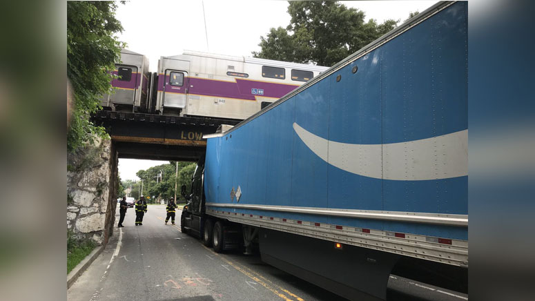 Police investigate after truck crashes into bridge in Dedham - Boston ...