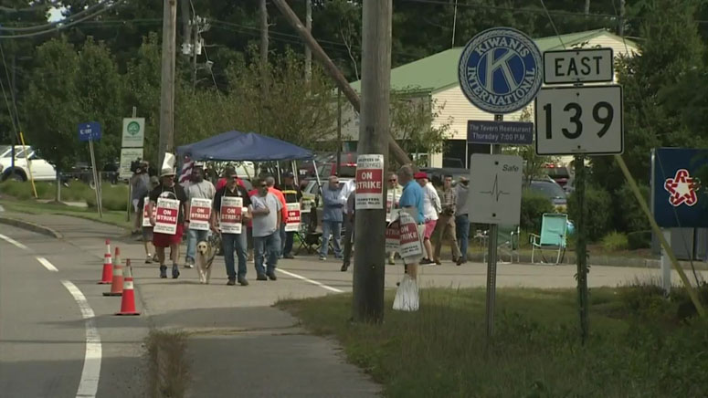 Garbage collection workers on strike amid fight for better benefits ...