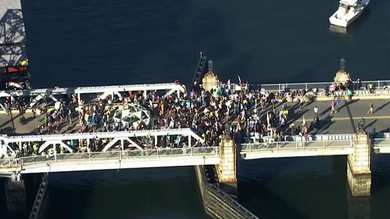 Climate change protesters block bridge in Boston - Boston News, Weather ...