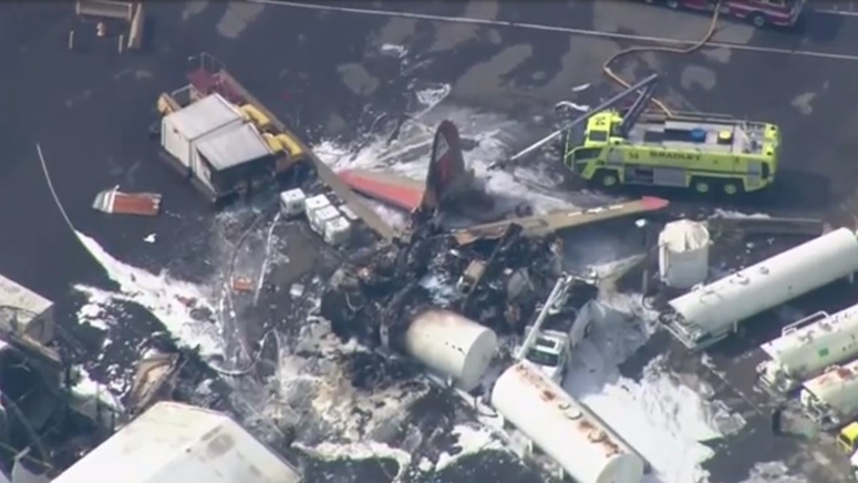 7 reported dead after World War II-era bomber crashes into building at ...