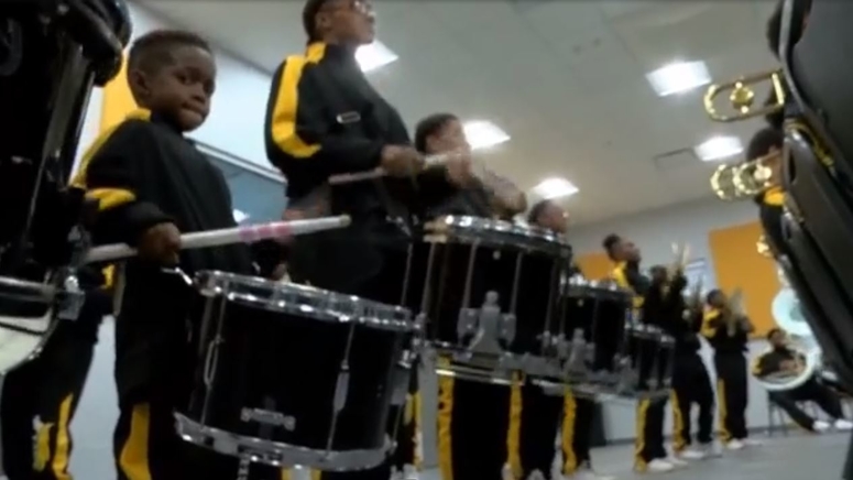 5-year-old drummer turning heads as he marches in high school band ...
