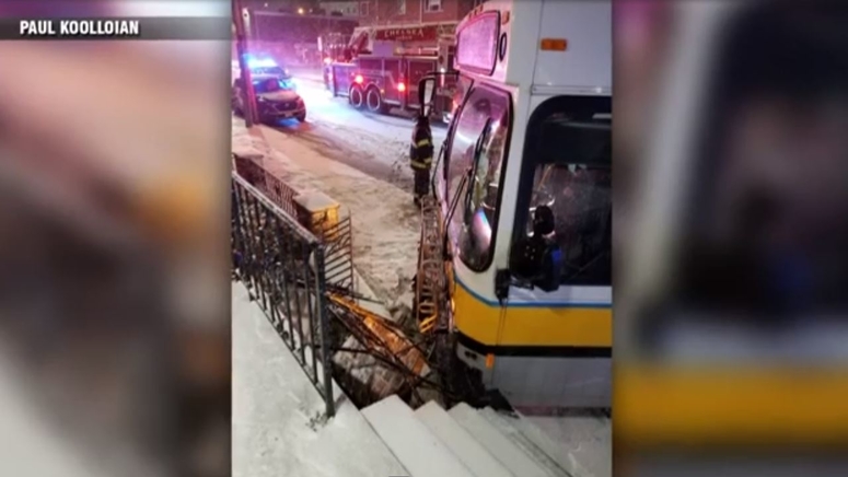 MBTA bus smashes into building in Chelsea as drivers deal with slick ...