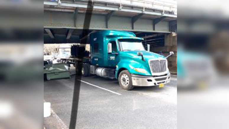 Storrow Drive closed for 11 hours after truck hits bridge, spills ...