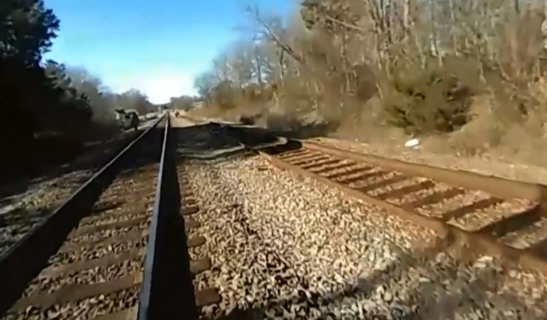 Body camera video records moment officer is hit by a train - Boston ...