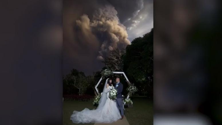 Couple gets married in Philippines while volcano erupts in background ...
