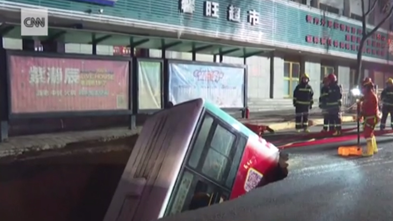 Bus falls into sinkhole on road in China; 10 dead or missing - Boston ...
