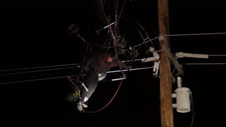 Crews rescue paraglider tangled in high-voltage power lines for 3 hours ...