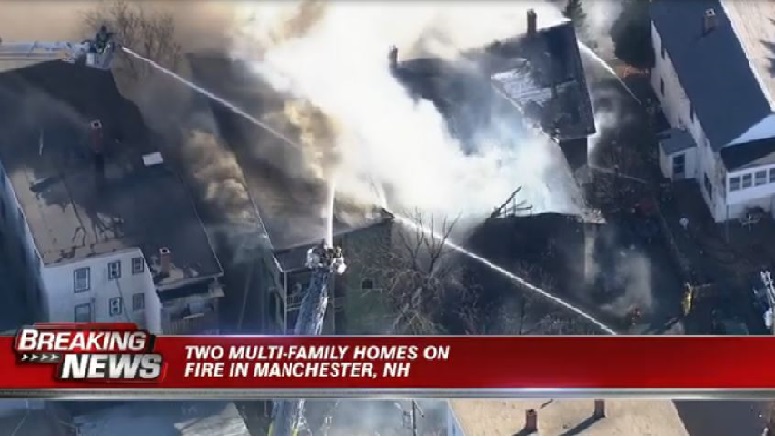 Fire crews battling blaze involving 2 multi-family homes in Manchester ...