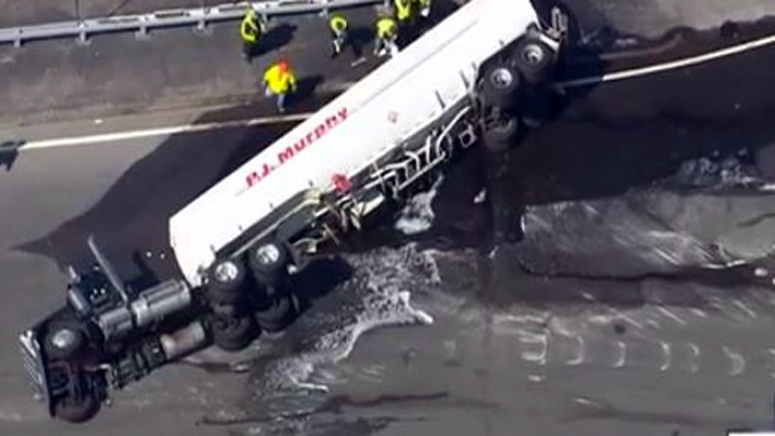 Fuel tanker rollover spills hundreds of gallons of gas on Revere road ...