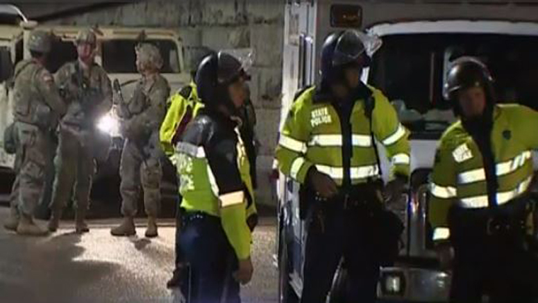 Officers, demonstrators clash as peaceful protest turns tense in ...