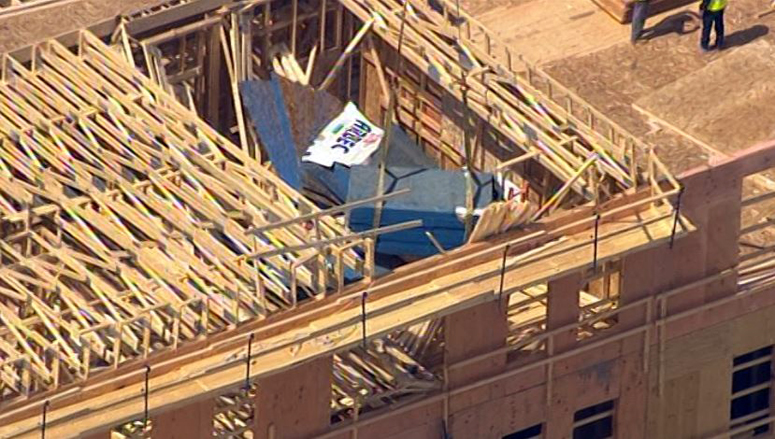 3 construction workers injured after beams fall from crane in Revere ...