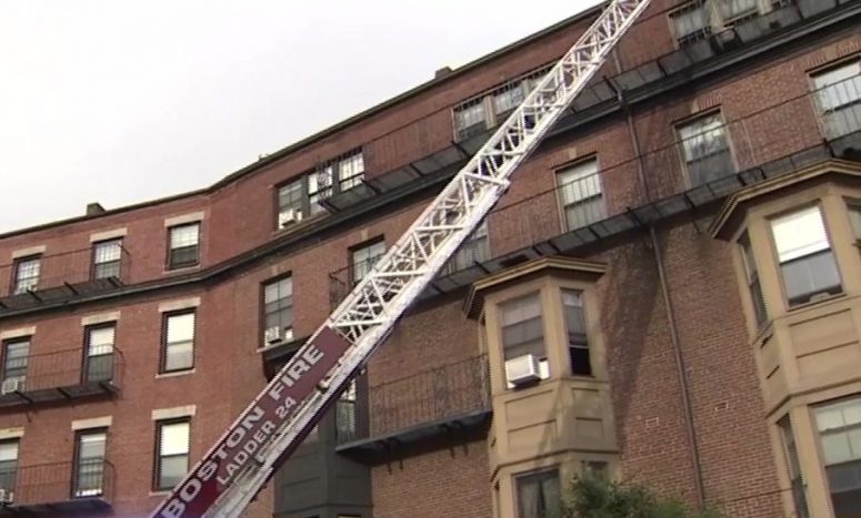 Firefighters rescue 2 people from burning building in Boston - Boston ...