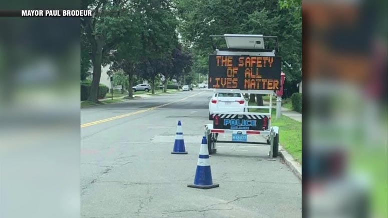 Controversial message displayed on Melrose sign prompts apology ...