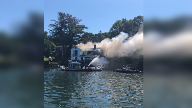 Crews use police boat to battle house fire in Gloucester that left pets ...