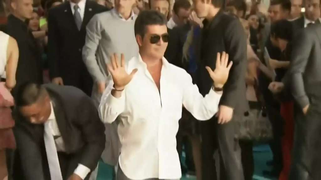 Simon Cowell has surgery for broken back after bike accident – Boston ...