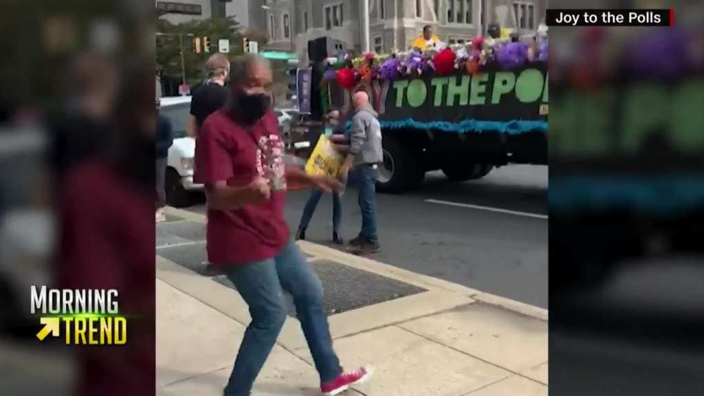 People are literally dancing in the streets as they wait to vote ...