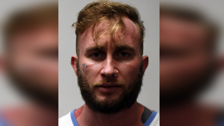 Police Man Arrested After Threatening Spitting At Officers In