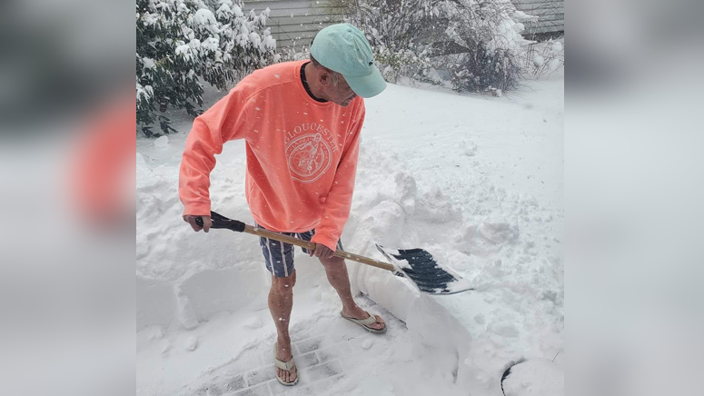 This man shoveling snow in shorts, sandals is the epitome of a true New ...