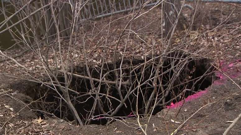 City officials investigating after mysterious 5 foot hole opens up in ...