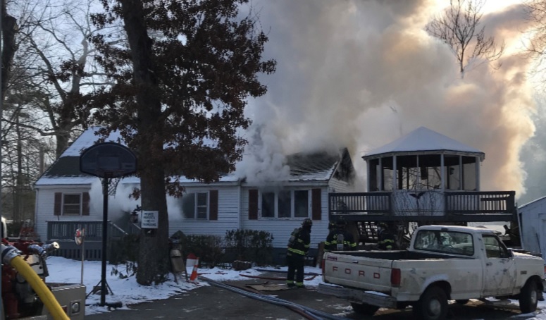 Firefighters brave frigid conditions while battling house fire in ...