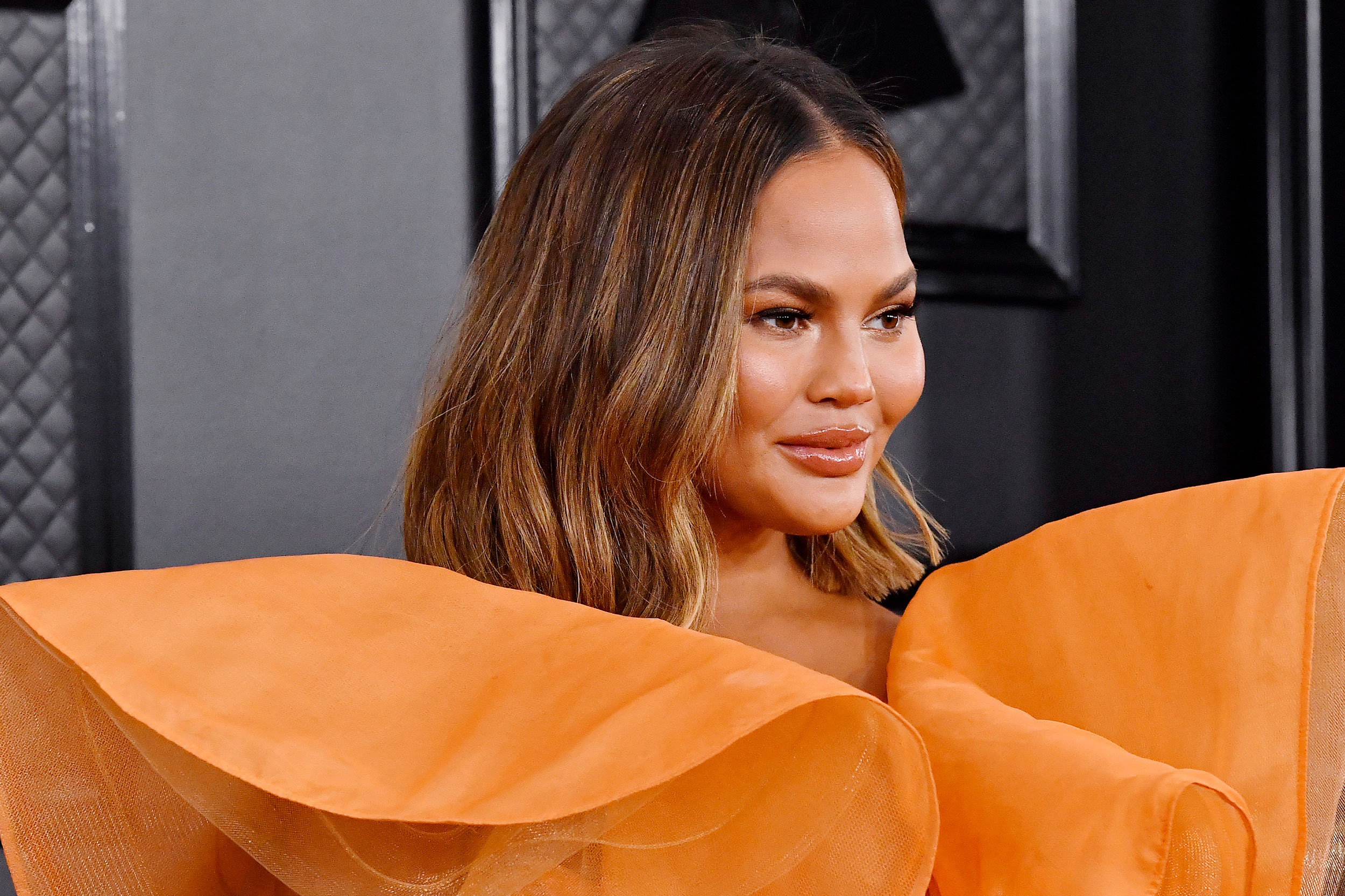 Chrissy Teigen lost a tooth in a Fruit Roll-Up at the inauguration ...