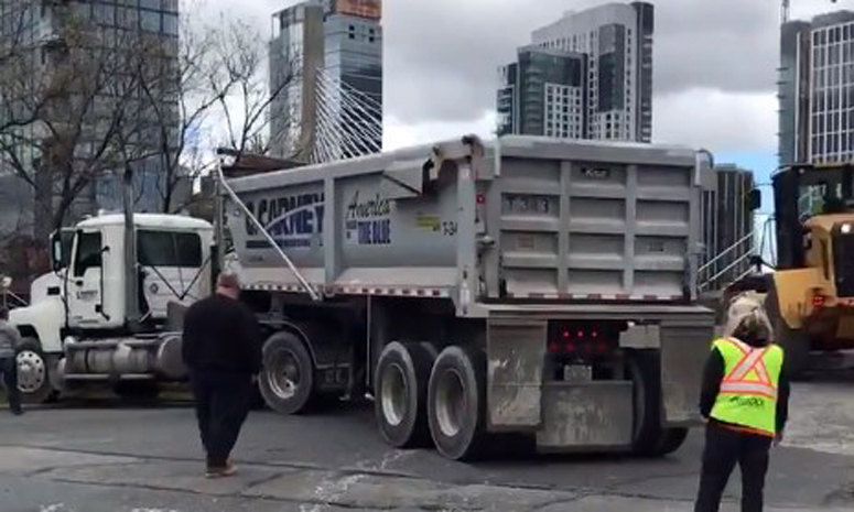 Cleanup underway after truck dumps load of concrete on ramp to ... Cleanup underway after truck dumps load of concrete on ramp to ...