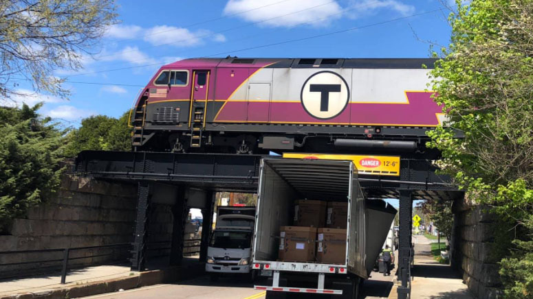 Tractor-trailer becomes wedged under bridge in Westboro - Boston News ...