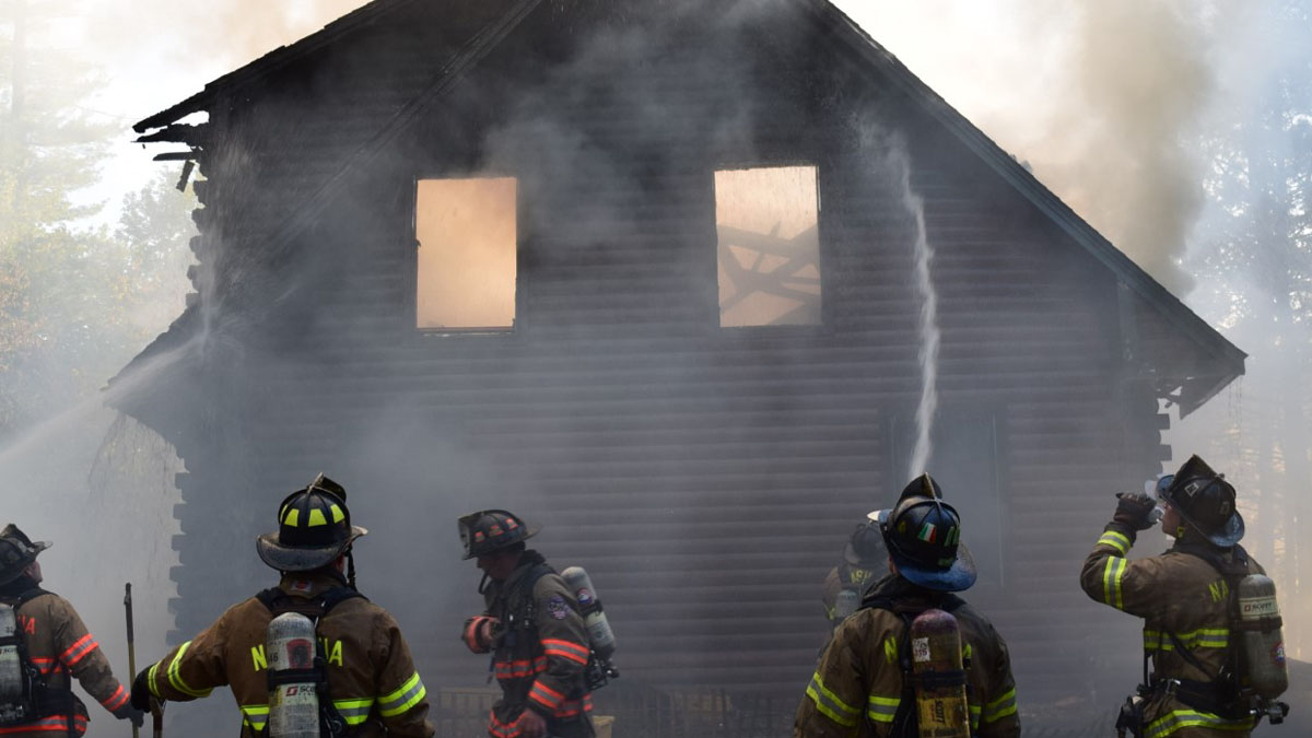 Woman jumps from second-story balcony of burning home in Merrimack, NH ...