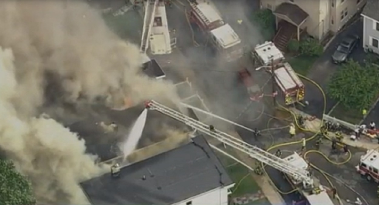 Firefighters battle soaring temps as they fight to extinguish 7-alarm ...