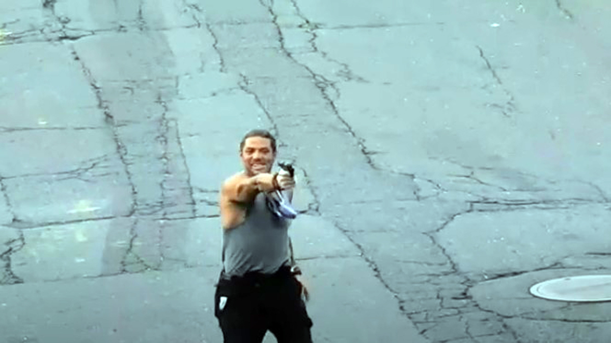 WATCH: Police release shocking video of man repeatedly pointing handgun ...