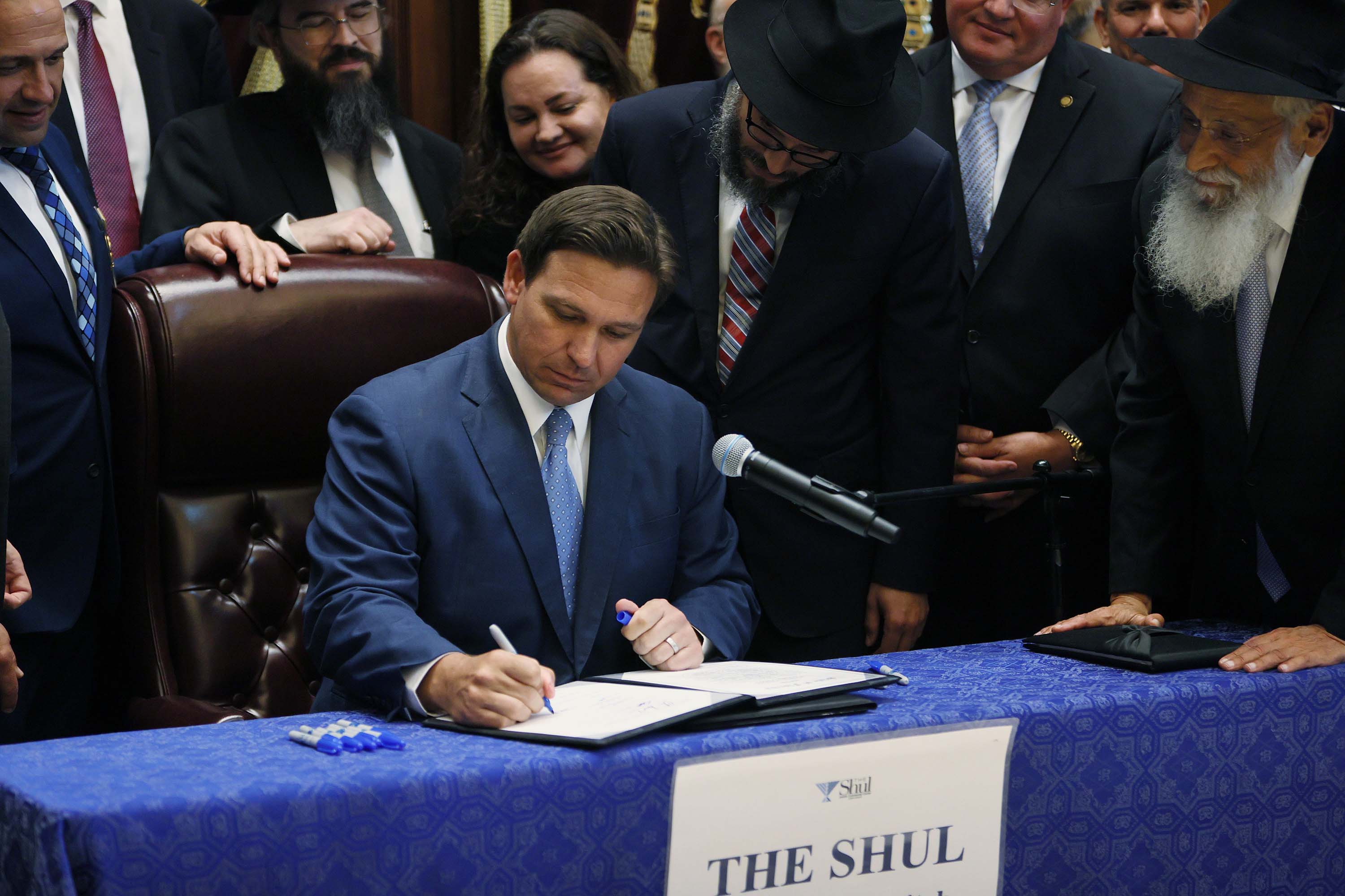 Florida governor signs new bill requiring K-12 public schools to hold ...