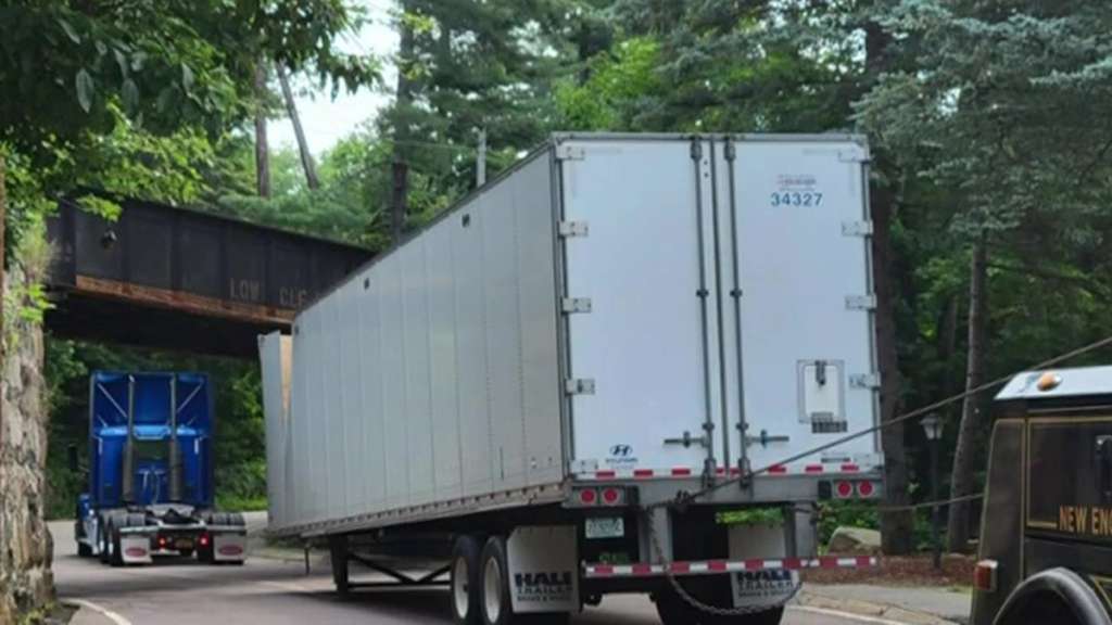 Tractor-trailer gets stuck under bridge in Canton - Boston News ...