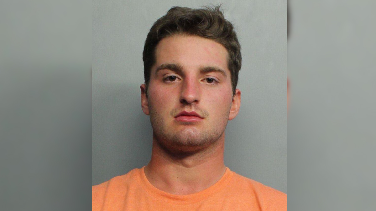 Police: Flight attendants duct tape passenger to seat after he punched ...