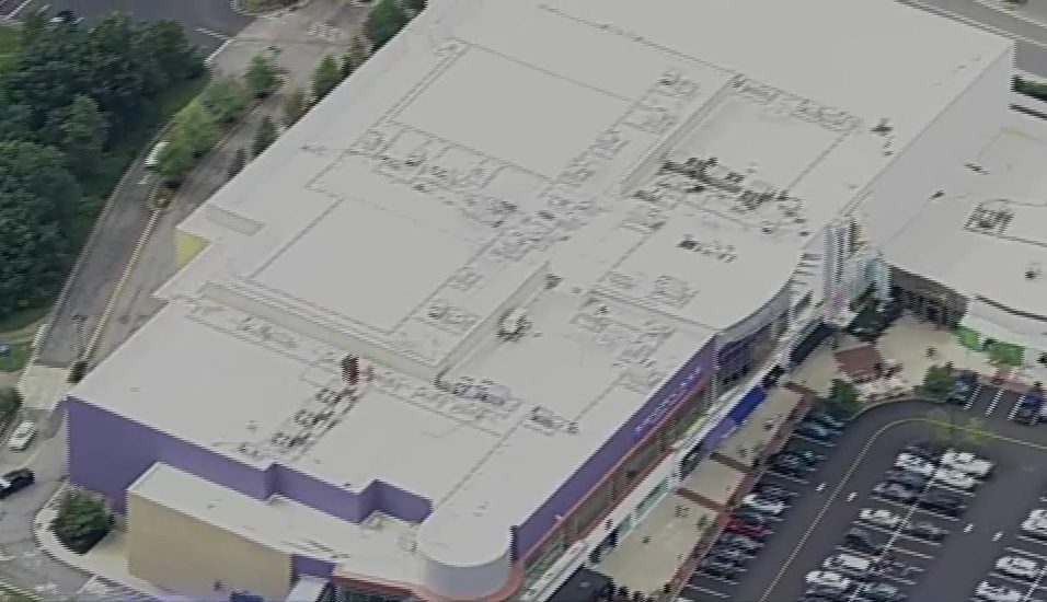 Dedham Mall evacuated after water main break floods 3 businesses ...