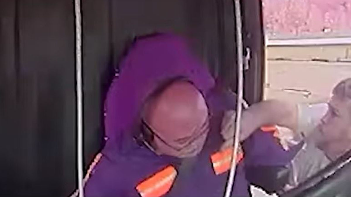 Road rage suspect caught on video punching truck driver in middle of ...