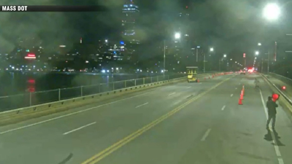 WATCH: Video shows vandals throwing cones off Mass. Ave. bridge ...