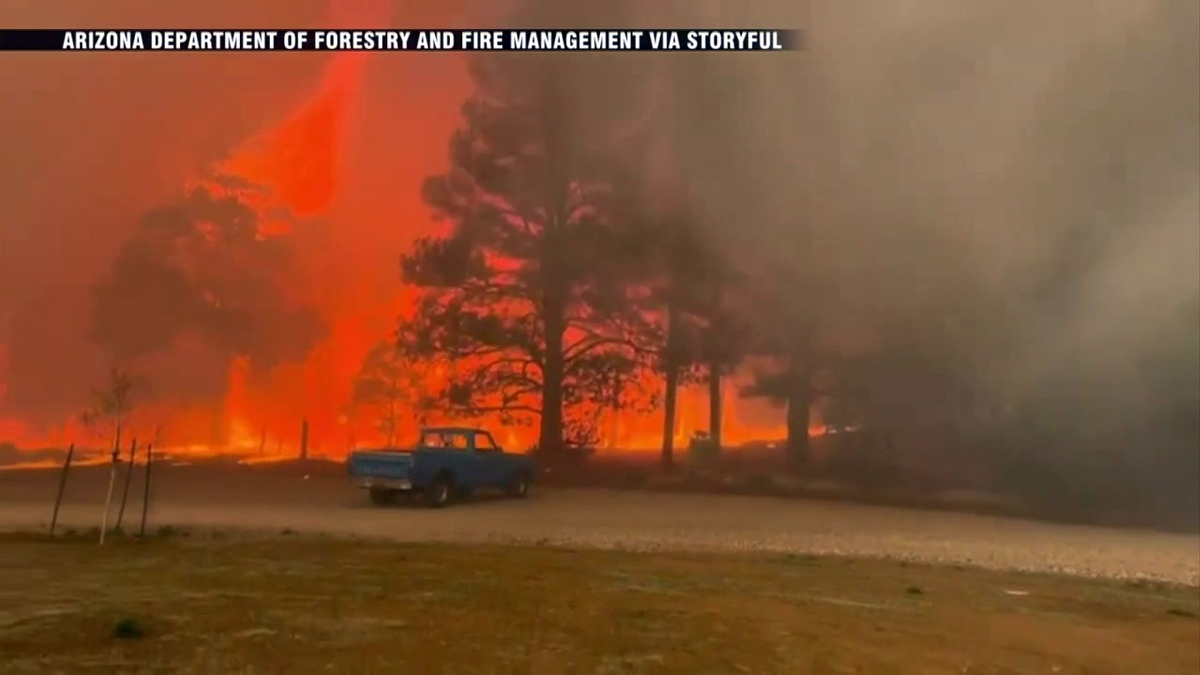 Rapidly moving wildfire in Arizona destroys dozens of structures and ...