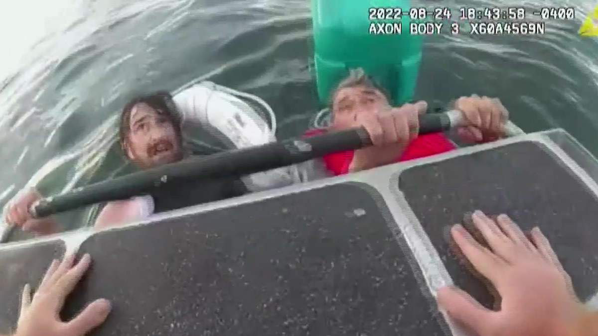 WATCH: Boston Harbor Patrol rescue father, son after ship takes on ...