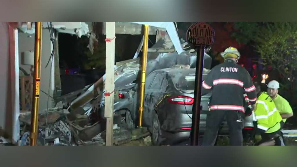 Police chase ends in Clinton with car totaling front of a house ...