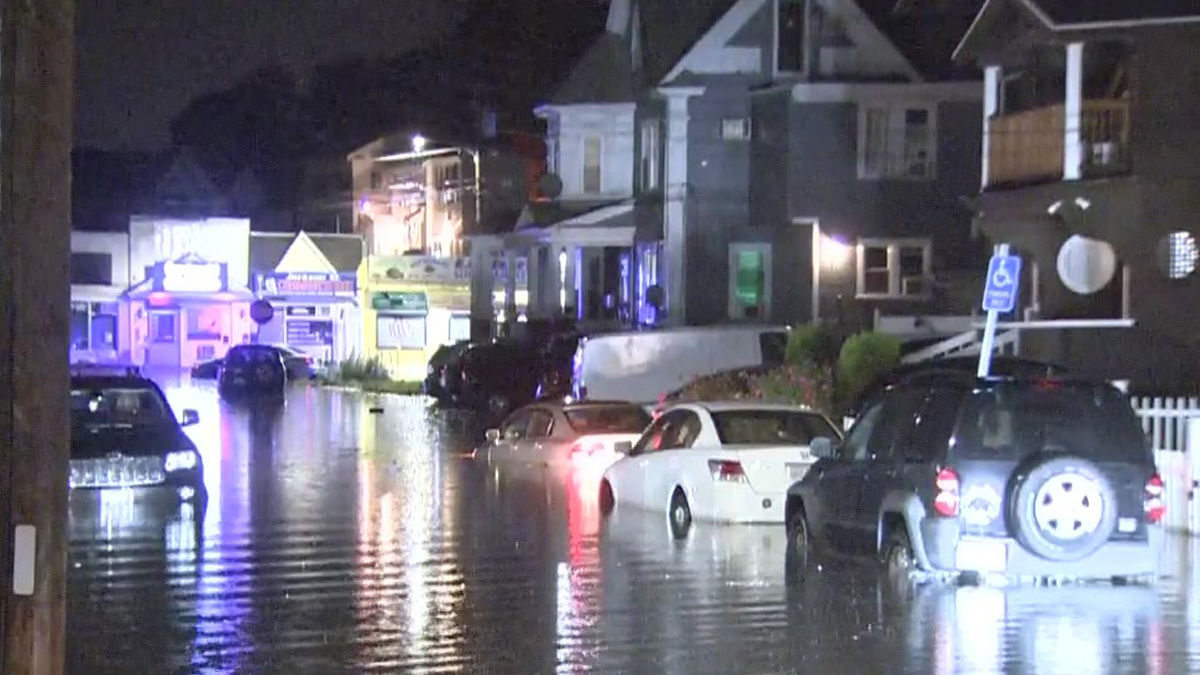 Lawrence firefighters rescue 4 people from flooded street - Boston News ...