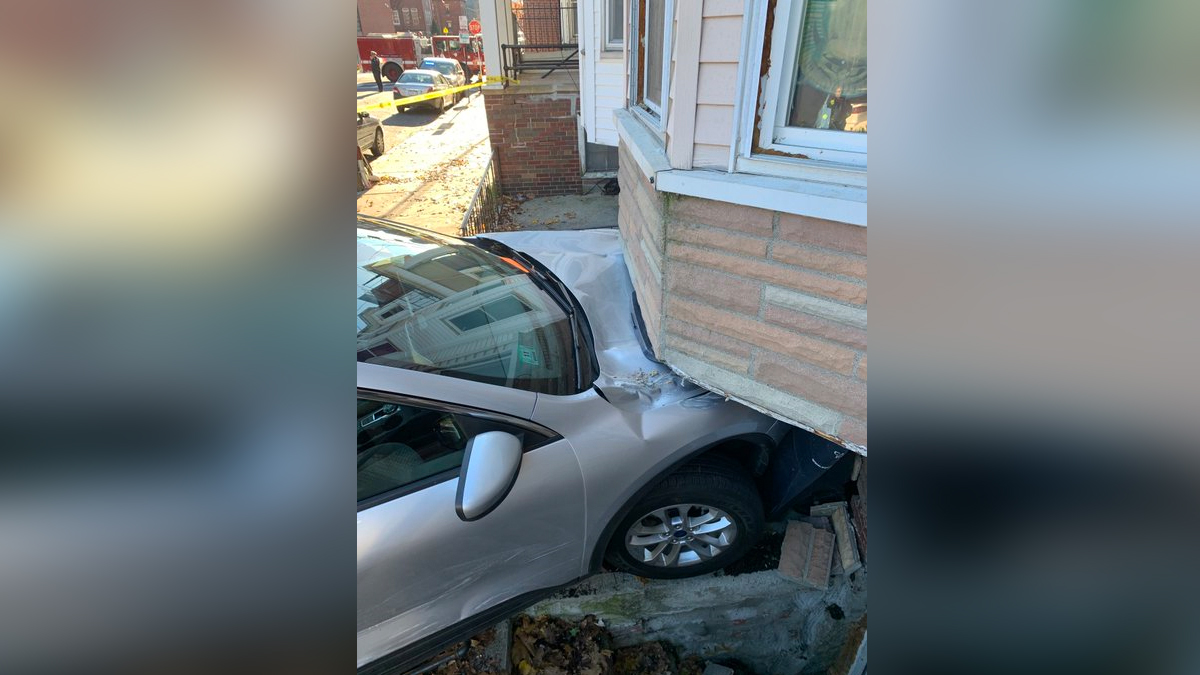 Vehicle crashes into East Boston building, displacing 16 residents ...