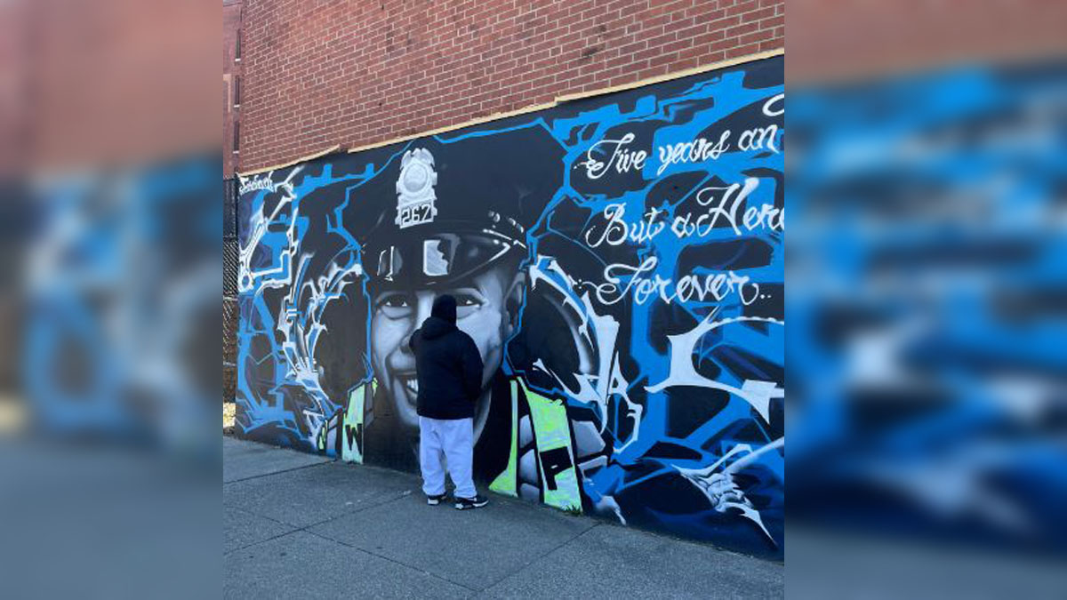 Local artist restores Worcester mural to fallen police officer - Boston ...