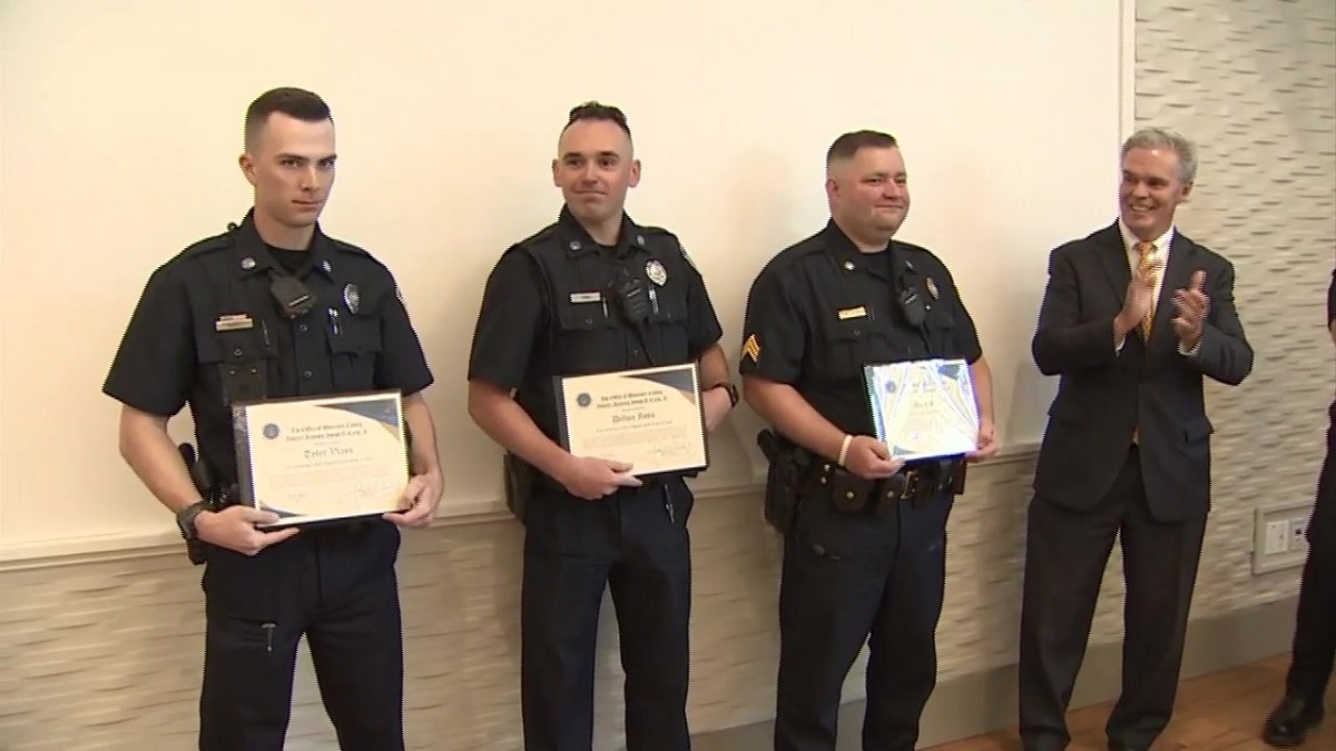 Shrewsbury police officers honored after February rescue of man stuck ...