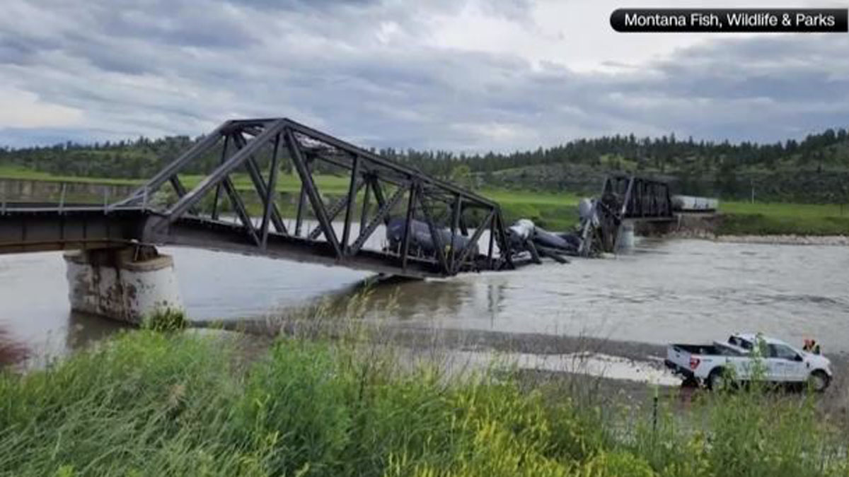Freight train carrying hot asphalt, molten sulfur plunges into ...