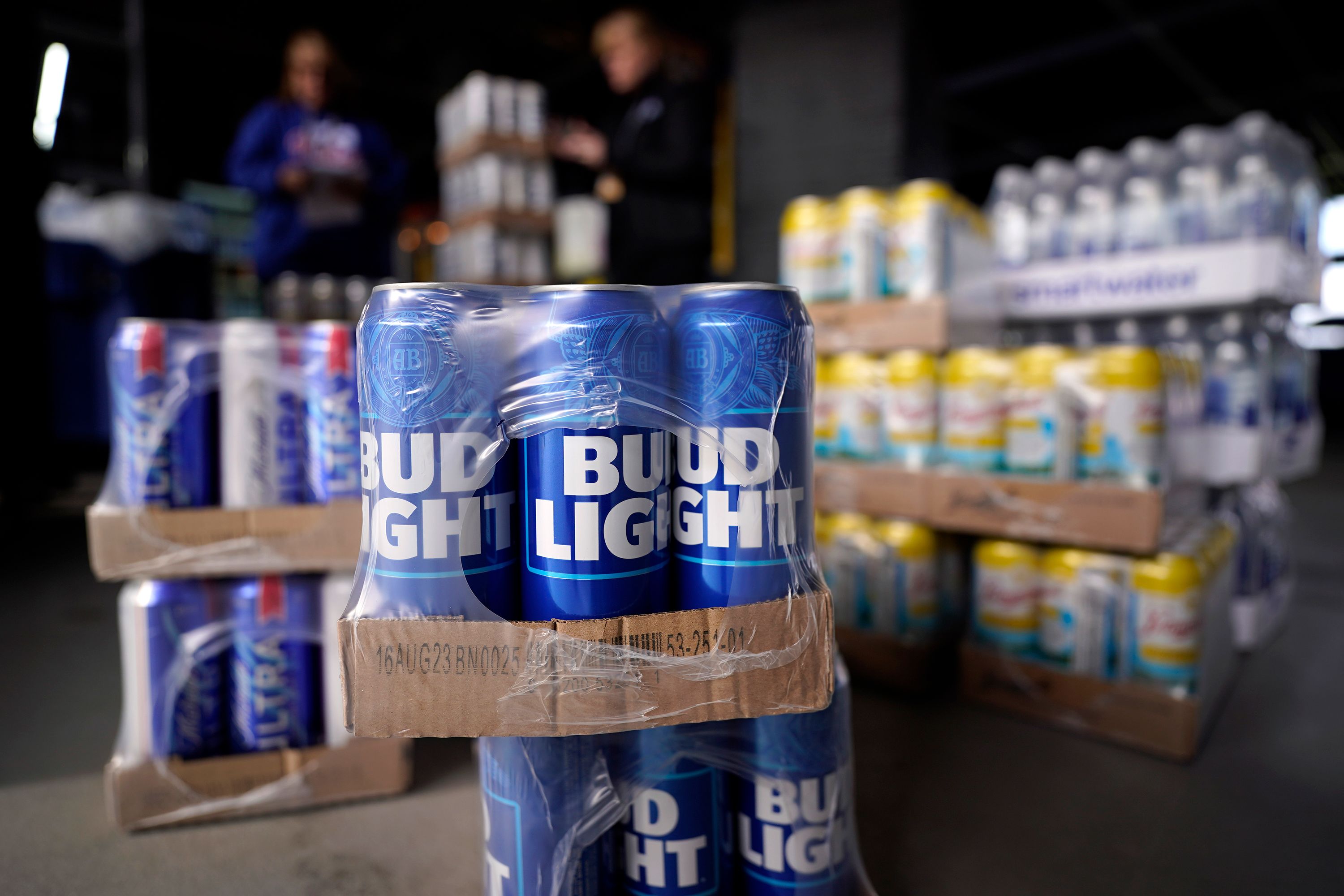 Anheuser-Busch is writing checks to distributors as Bud Light sales ...