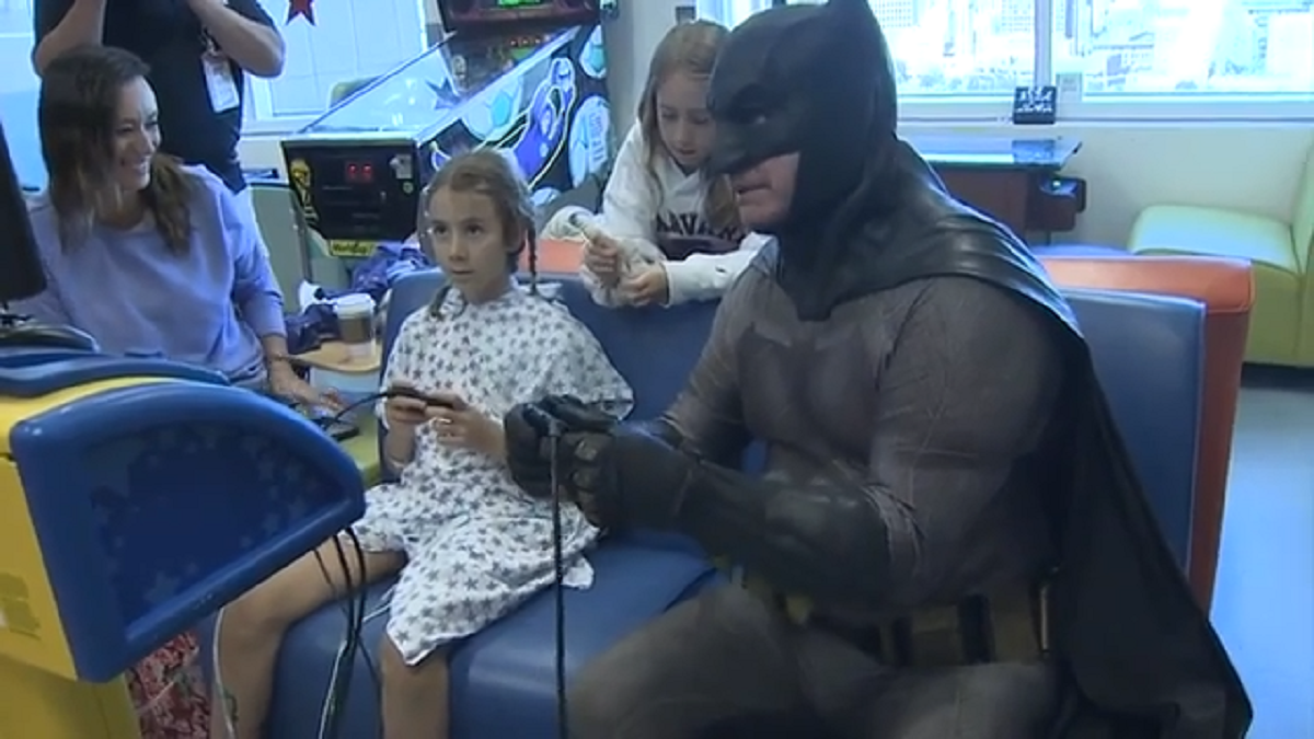 Batman, Captain Marvel among superheroes bringing smiles to children at ...