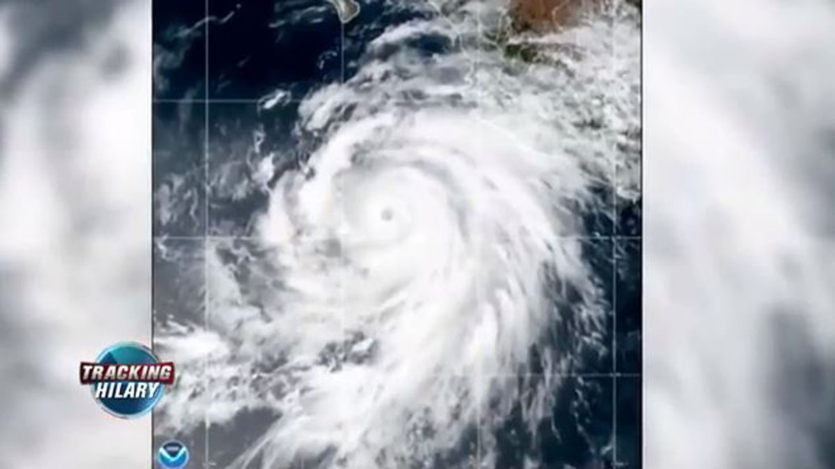 Rains from Tropical Storm Hilary swamp roads, trap cars and flood ...