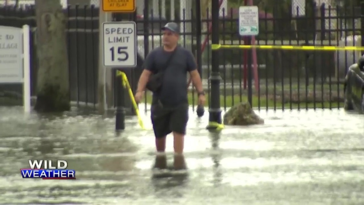 Thousands lose power, roads flood as heavy rain and high winds lash ...